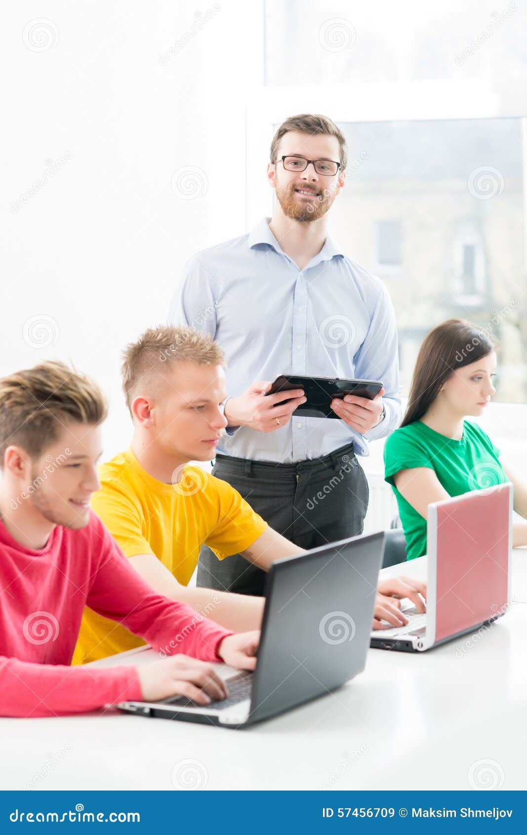 Young and Smart Students Learning in a Classroom Stock Image - Image of ...