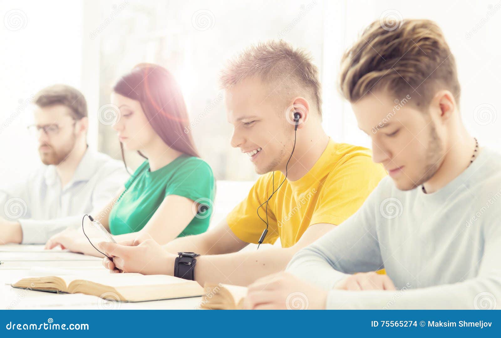 Young and Smart Students Learning in a Classroom Stock Photo - Image of ...