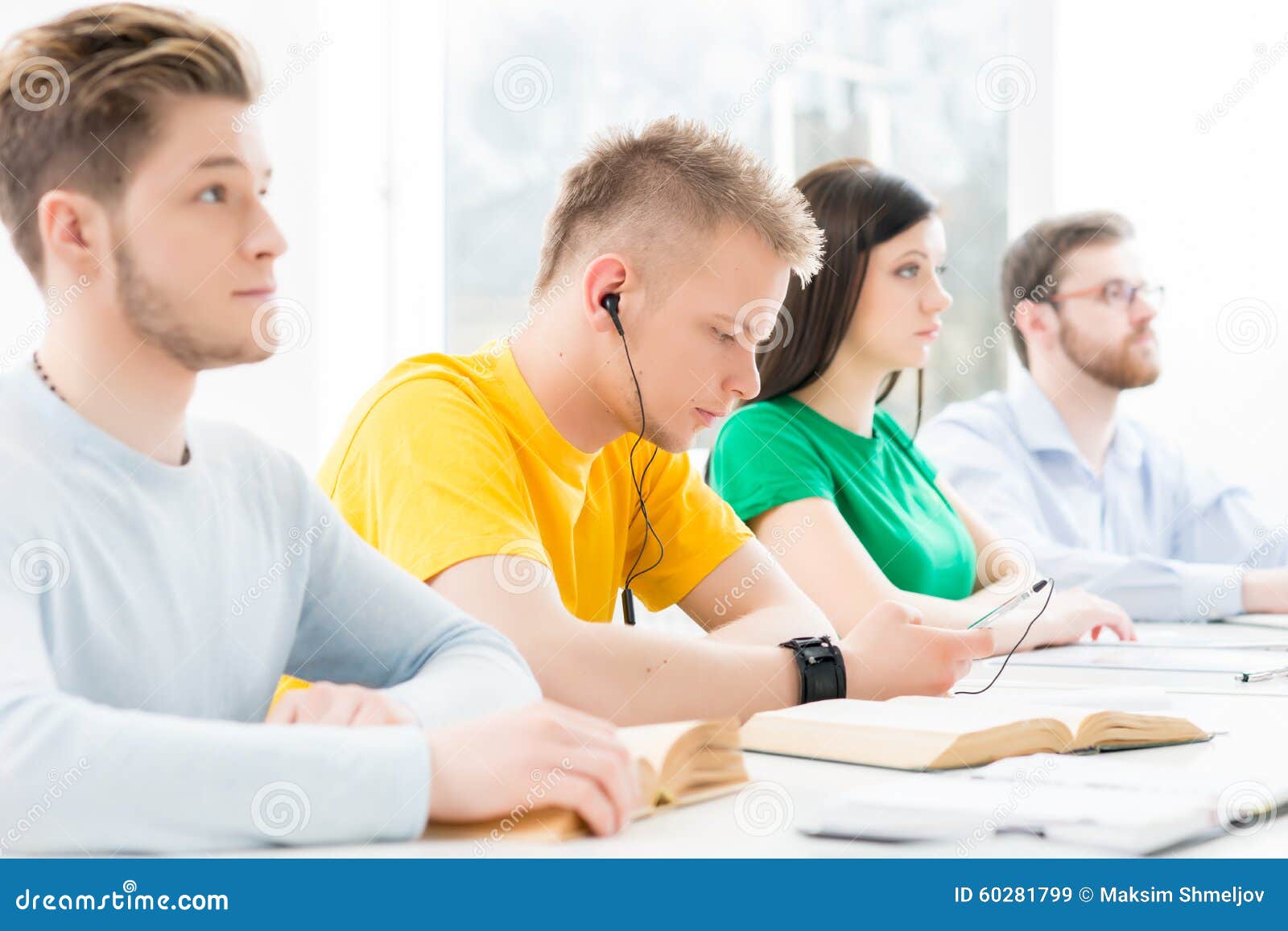 Young and Smart Students Studying in a Classroom Stock Image - Image of ...