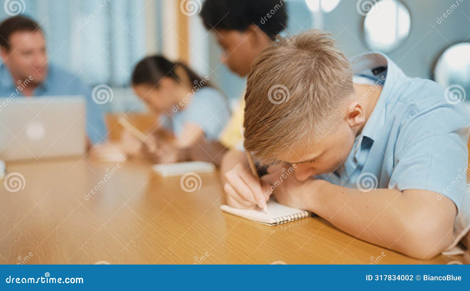 Young Smart Teenager Writing and Talking about Topic at Classroom ...