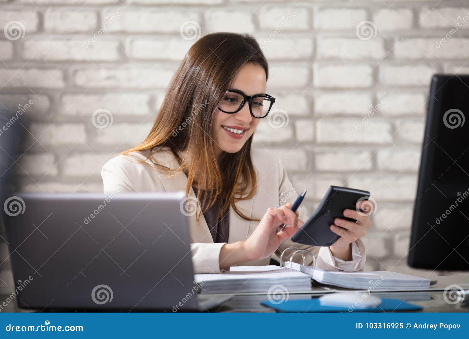 Smiling Accountant Using Calculator Stock Image - Image of budget ...