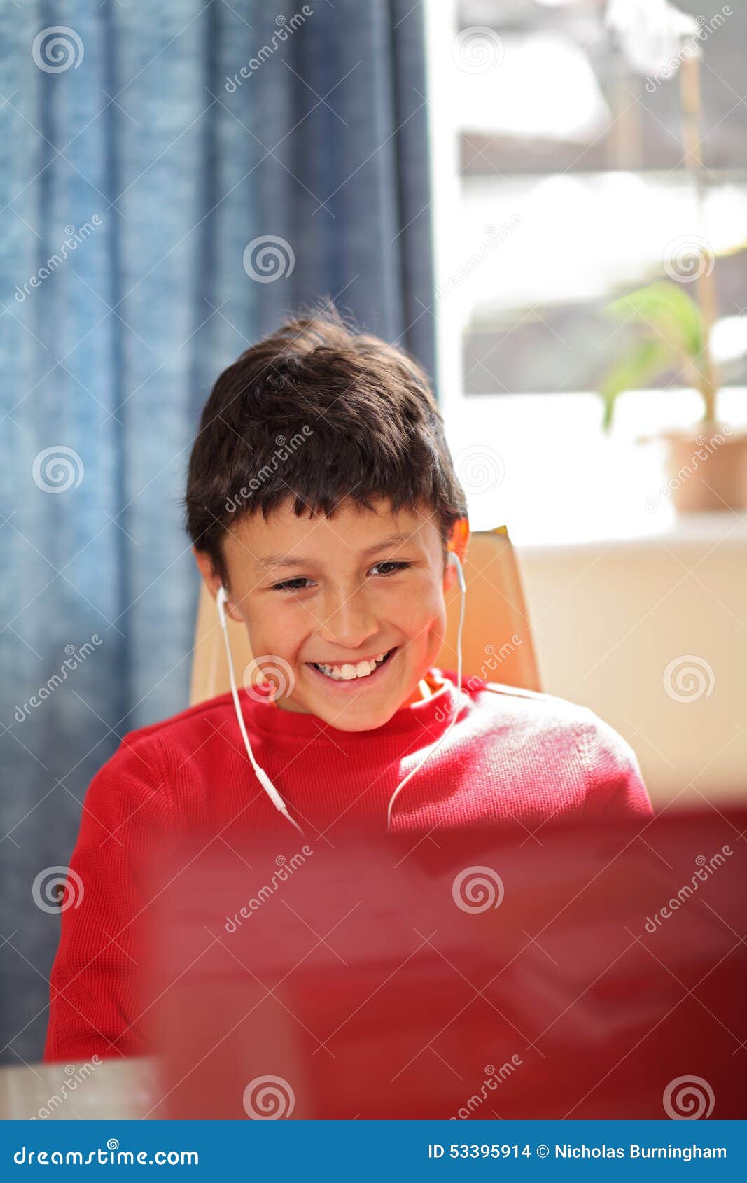 Young Smiling Boy Looking at a Computer Stock Photo - Image of line ...