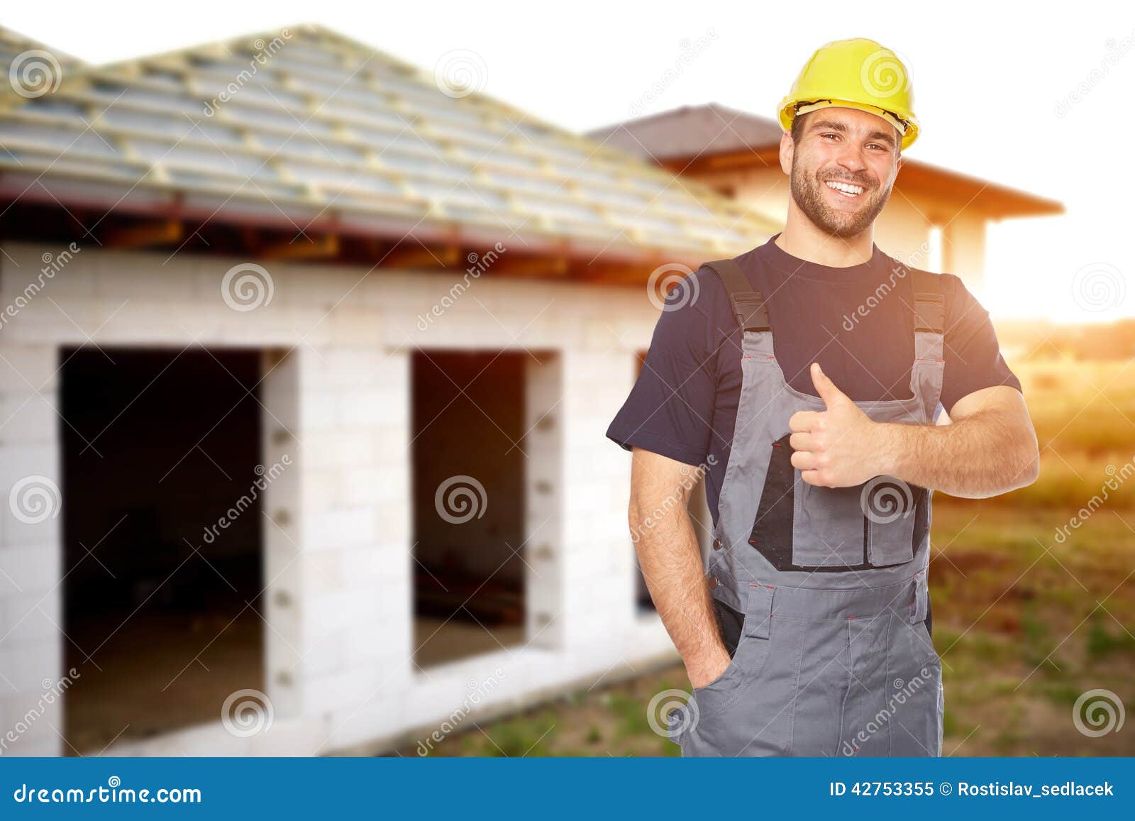 Young Smiling Builder Gesture with His Thumb Up. Toned Stock Image ...