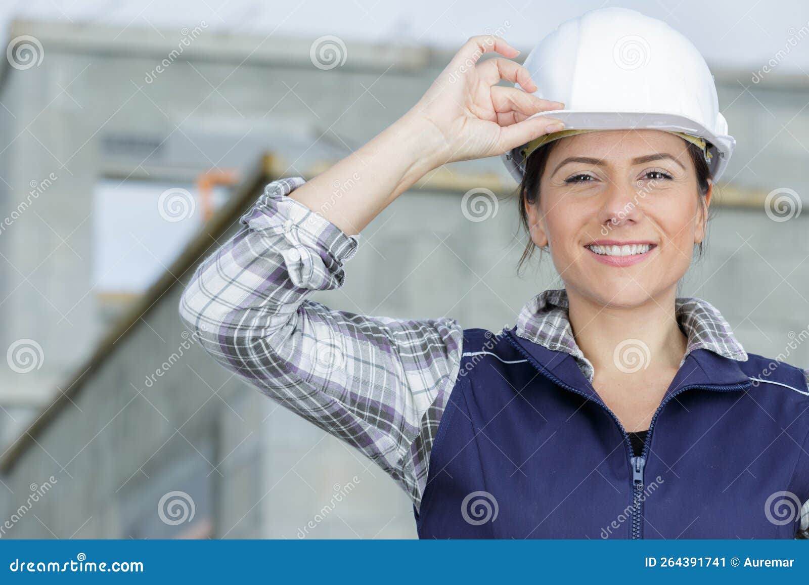 Young Smiling Builder Woman Stock Image - Image of alley, biker: 264391741