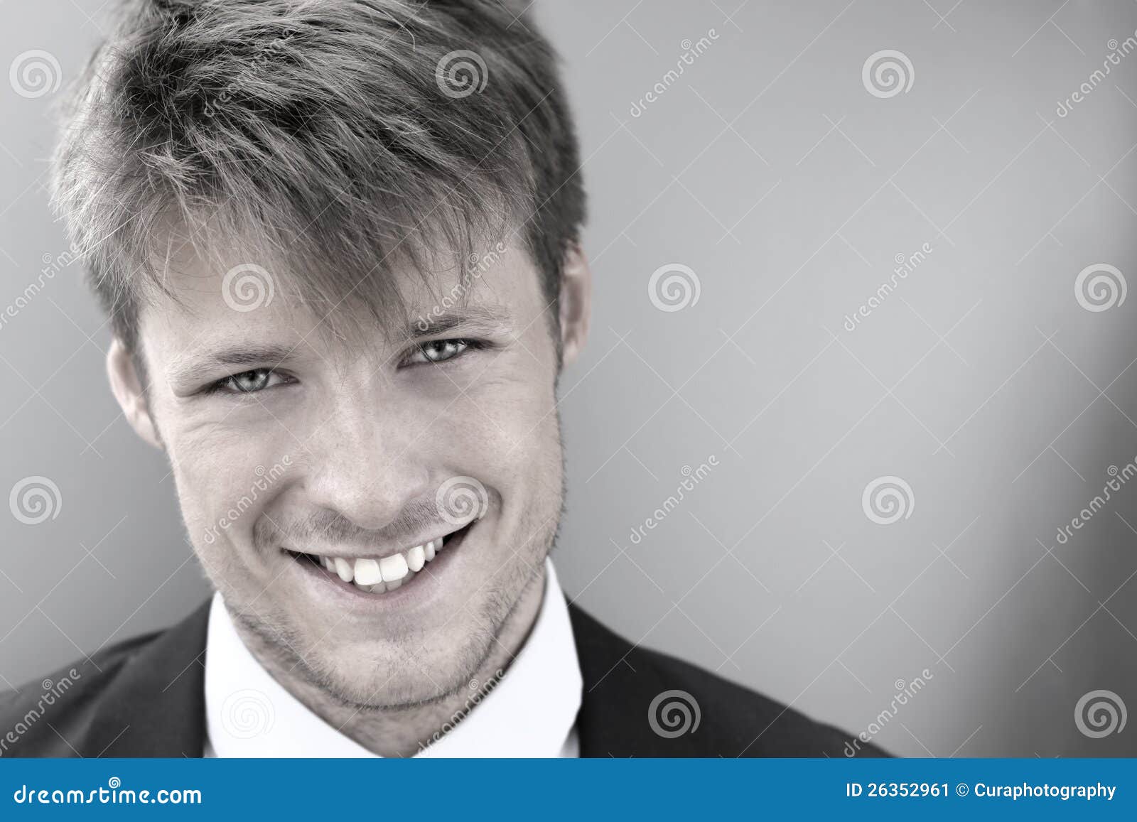 Young smiling business guy stock image. Image of positive - 26352961