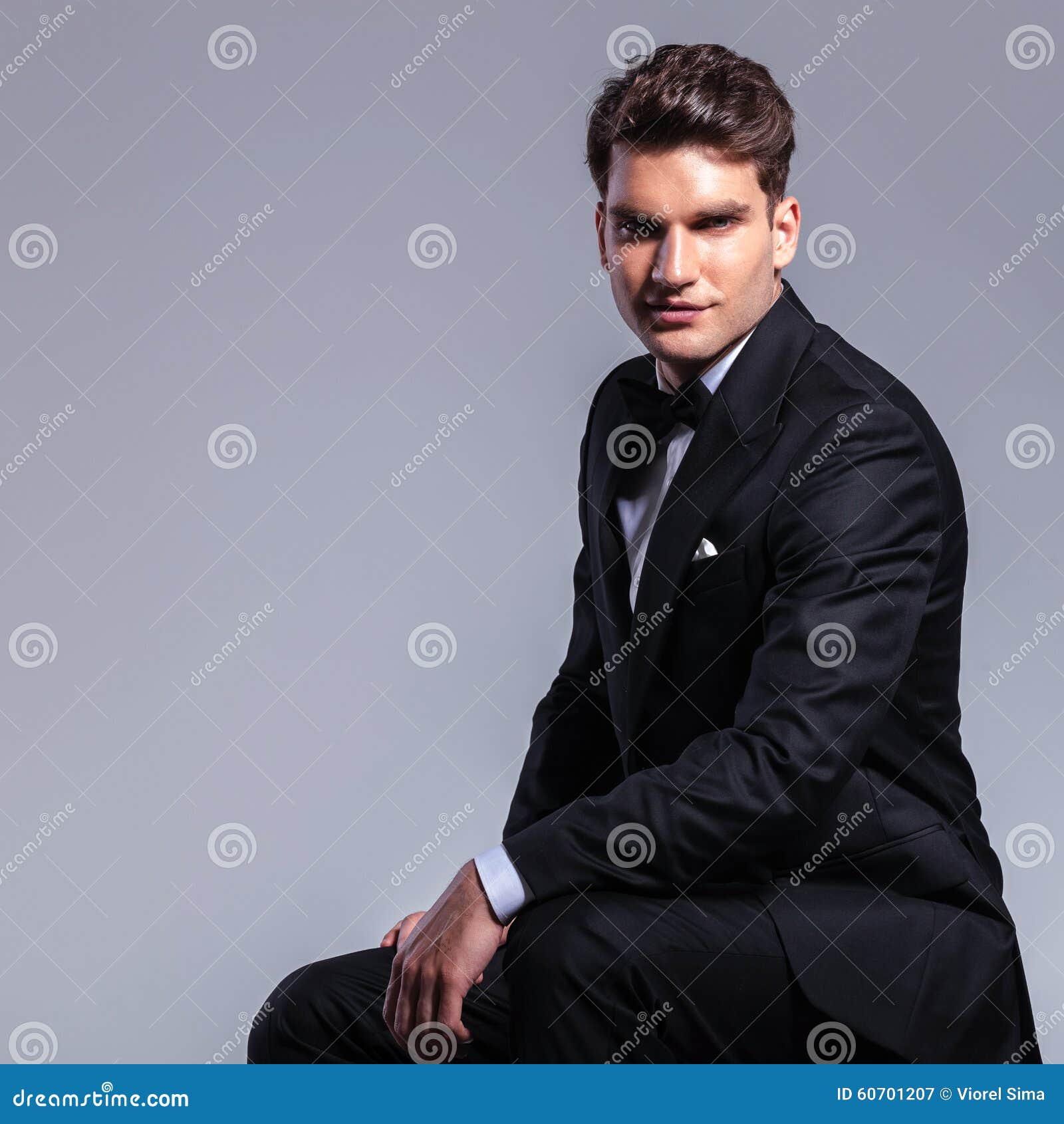 A Young Smiling Business Man Sitting. Stock Image - Image of person ...