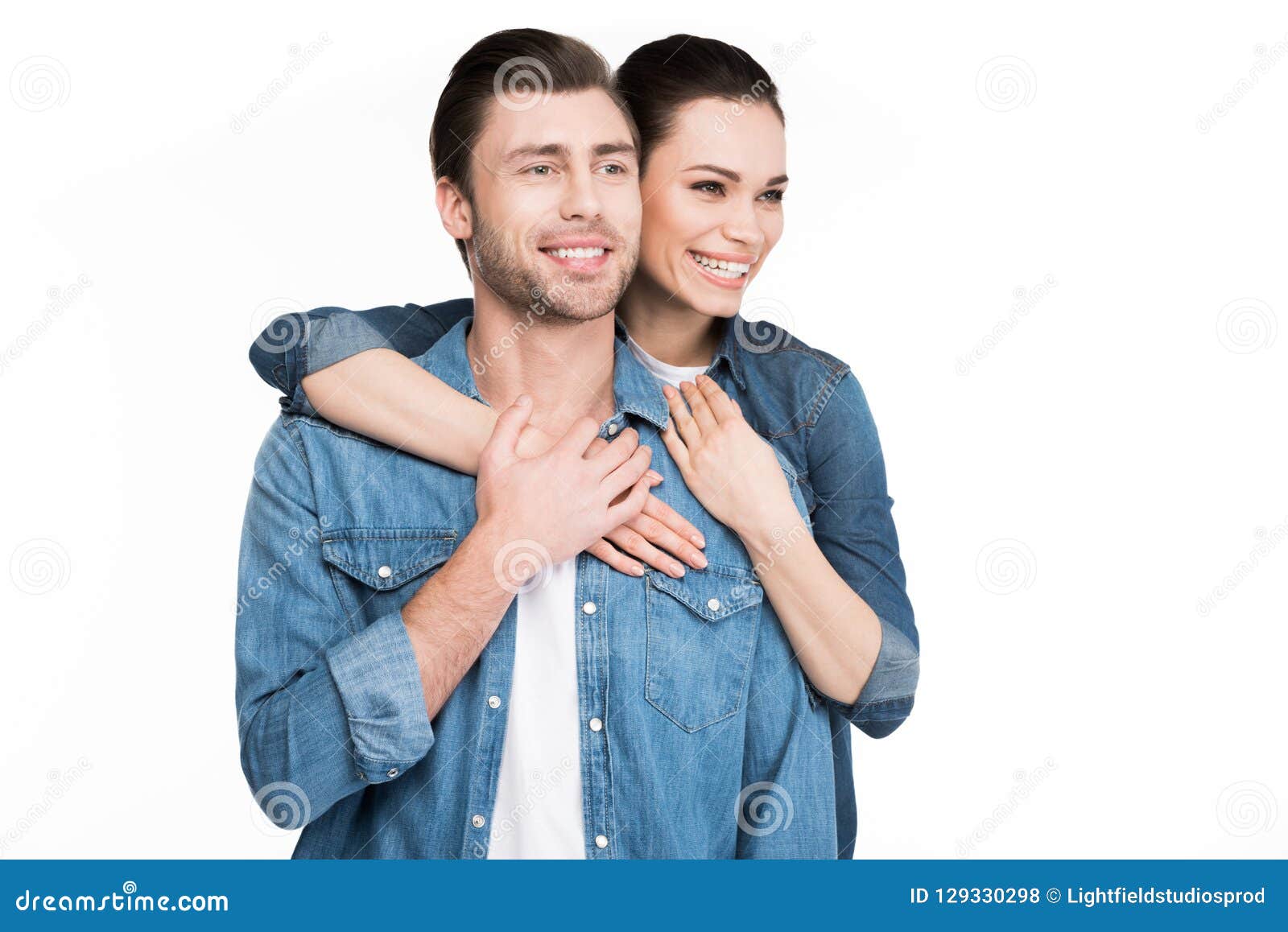 Young Smiling Couple in Denim Clothes Hugging Stock Photo - Image of ...