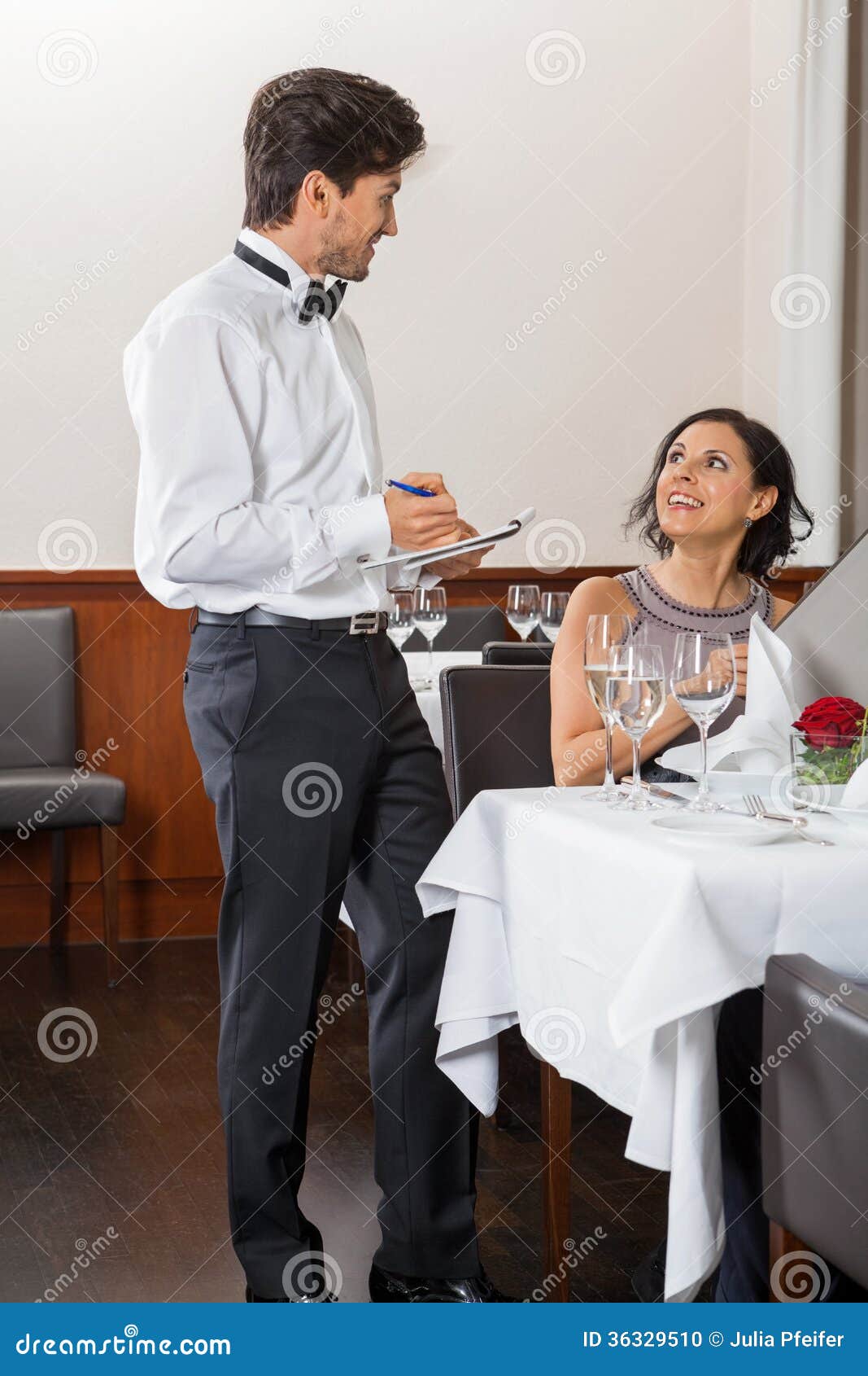 Young Smiling Couple at the Restaurant Stock Photo - Image of dinner ...