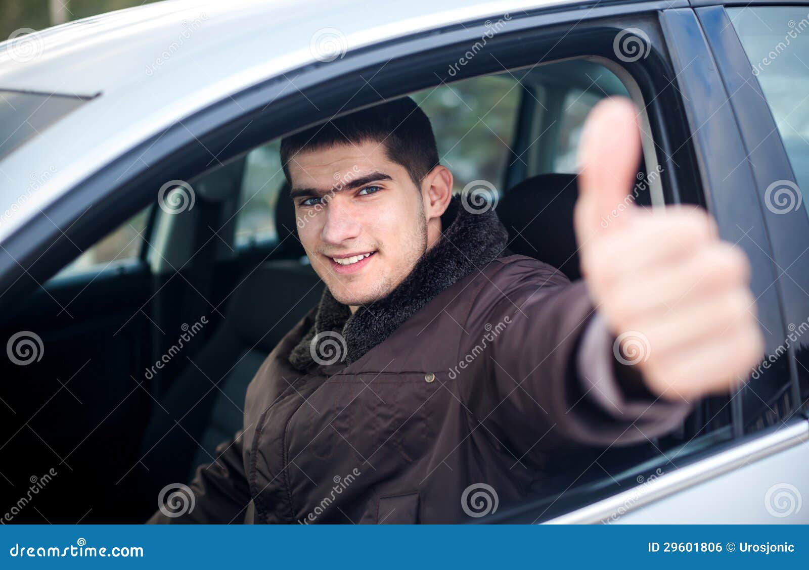 Young Smiling Driver Thumb Up in a Car Stock Photo - Image of learner ...