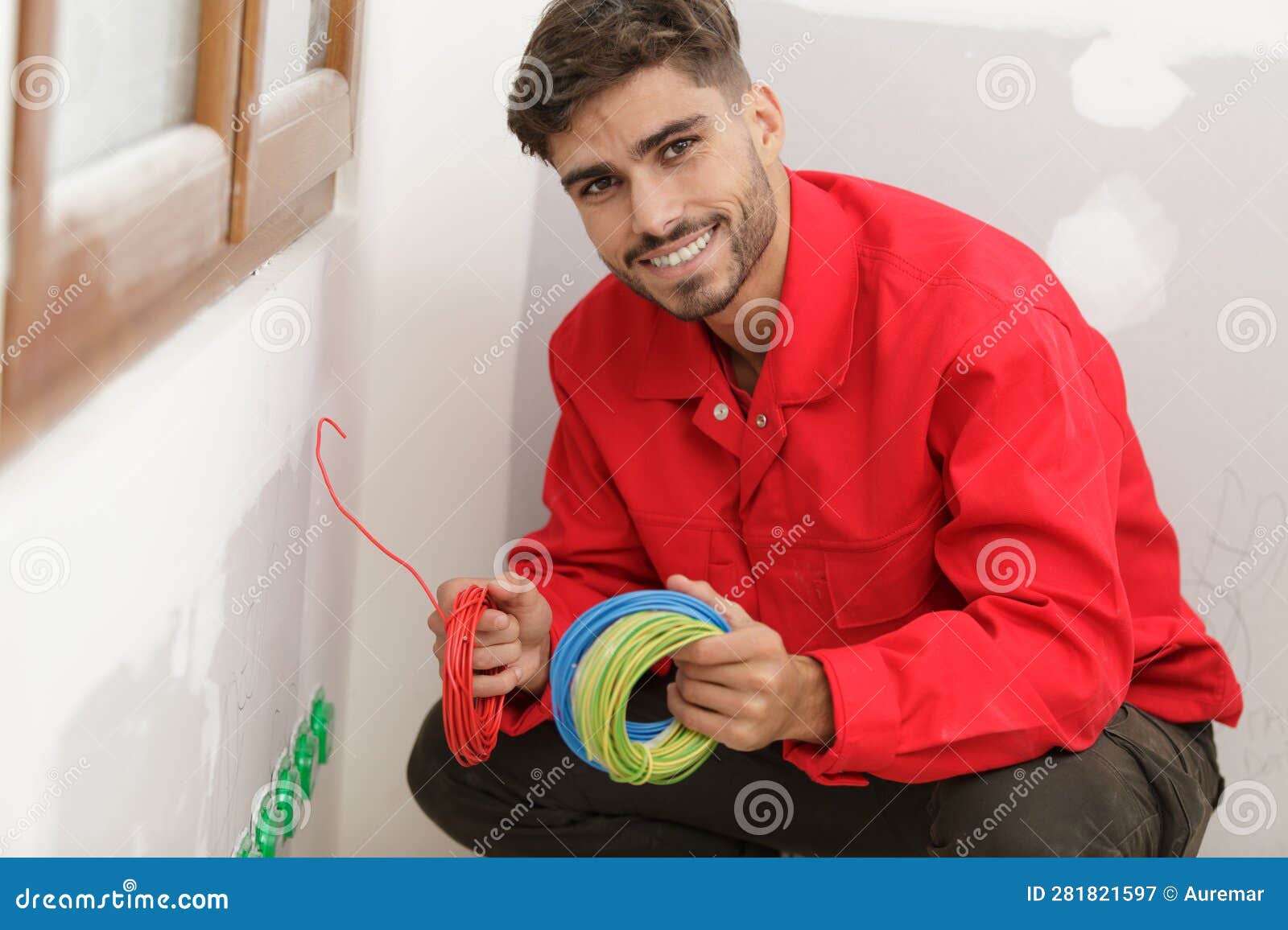 Young Smiling Electrician with Bunch Wires Stock Image - Image of ...