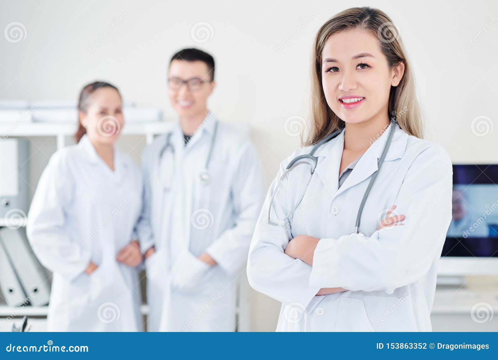 Young Smiling General Practitioner Stock Photo - Image of uniform ...