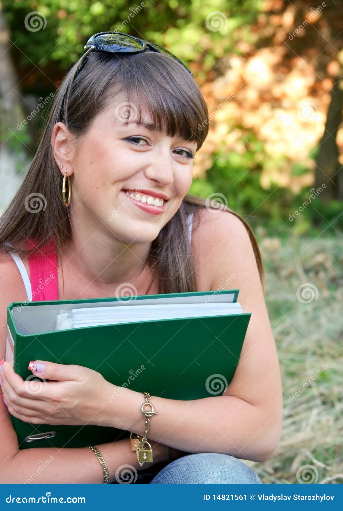 Young Smiling Girl with a Folder Stock Image - Image of people, lesson ...