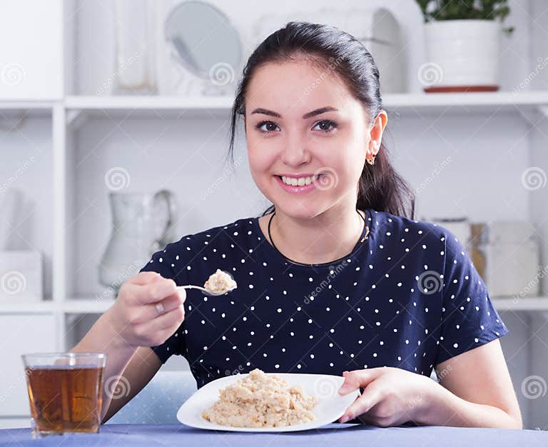 Smiling Girl Eating Cereal Stock Image Image Of Smiling 235266447