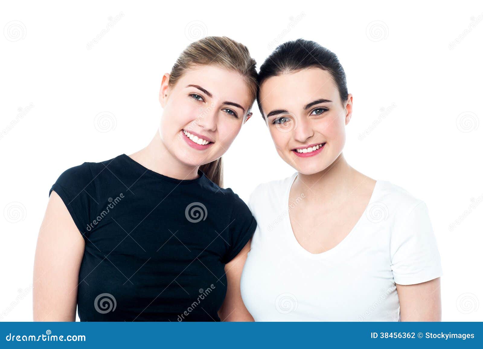 Young Smiling Girls Looking at You Stock Photo - Image of posing ...