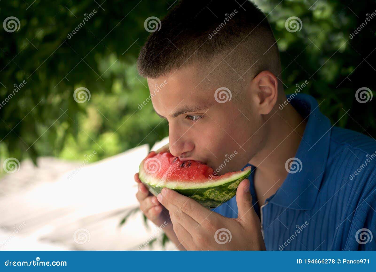 Young Smiling Guy Eats a Slice of Watermelon Stock Photo - Image of ...