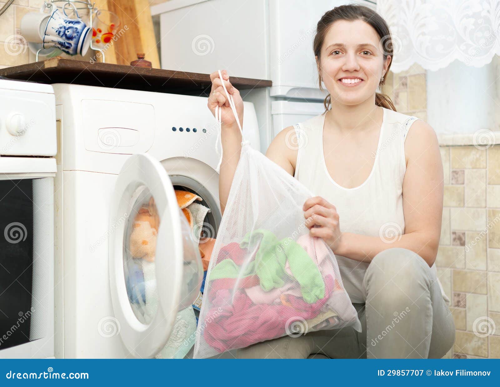 Smiling Housewife with Laundry Bag Stock Image - Image of clothes ...