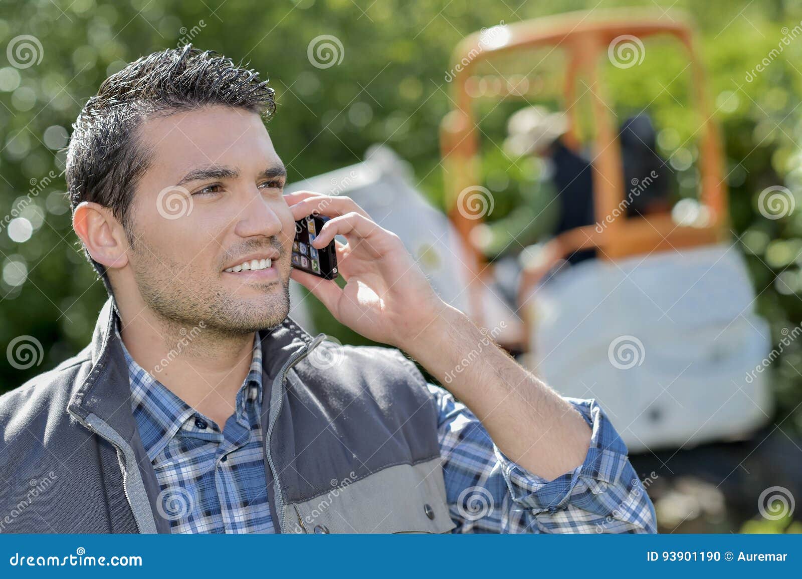 Young and Smiling Labourer on Phone Stock Photo - Image of young ...