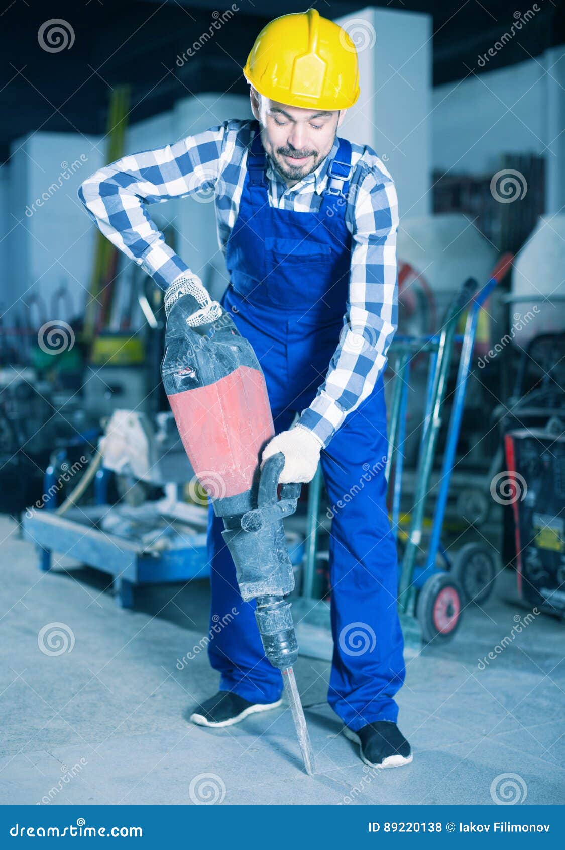 Young Smiling Male Using Jackhammer for Construction Stock Photo ...