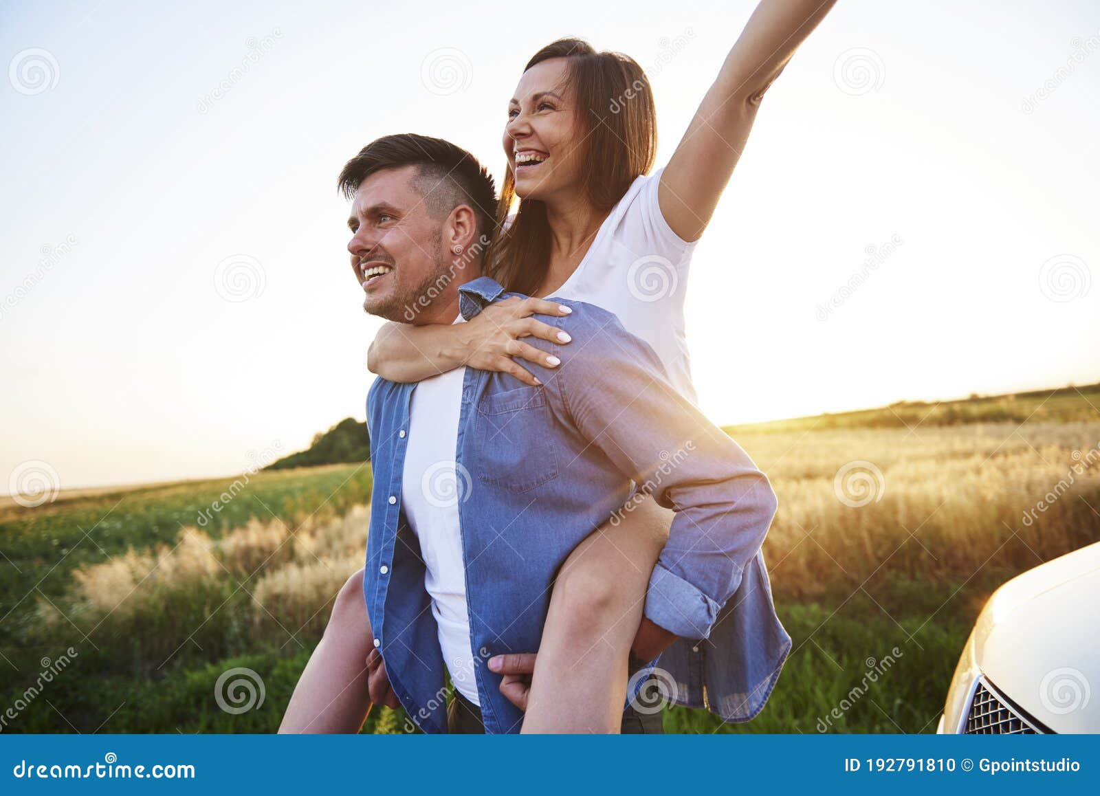 Young Man Carrying Girlfriend on His Shoulders Stock Photo - Image of ...