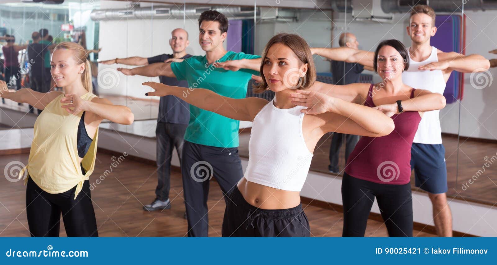 Young Smiling People Studying Zumba Elements Stock Image - Image of ...