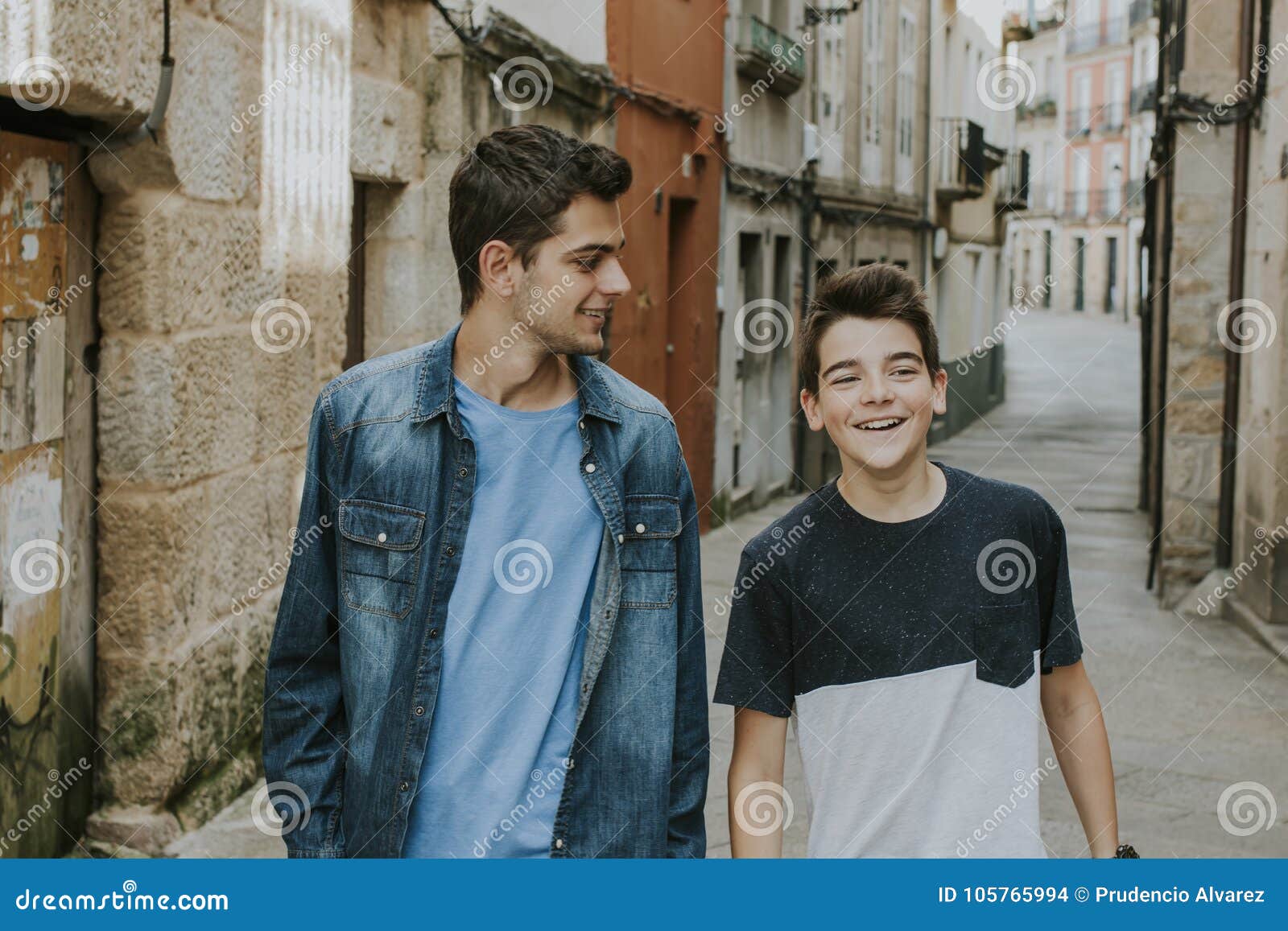 Young smiling walking stock photo. Image of male, travel - 105765994