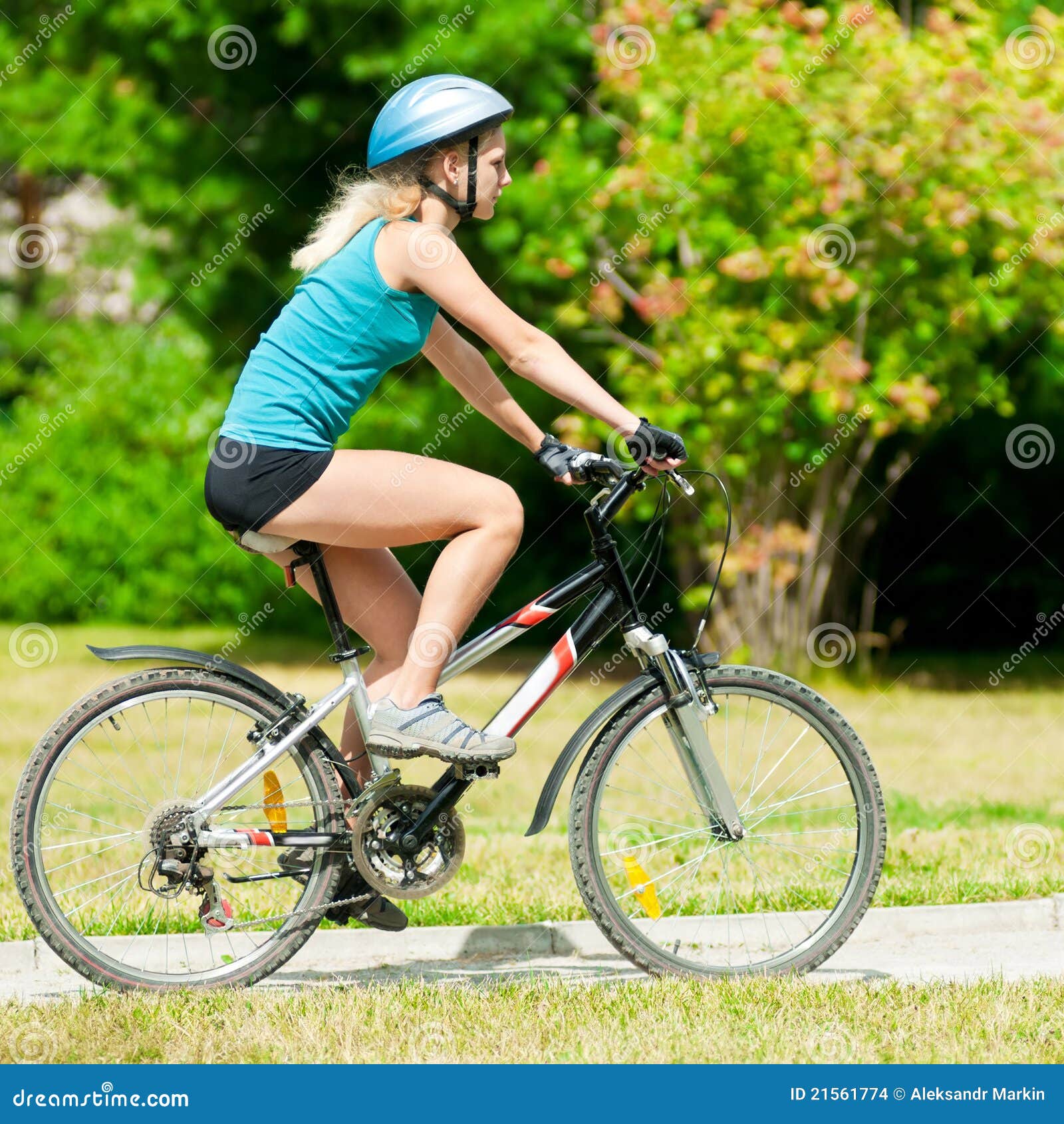 Young Smiling Woman on Bike Stock Photo - Image of motion, peaceful ...