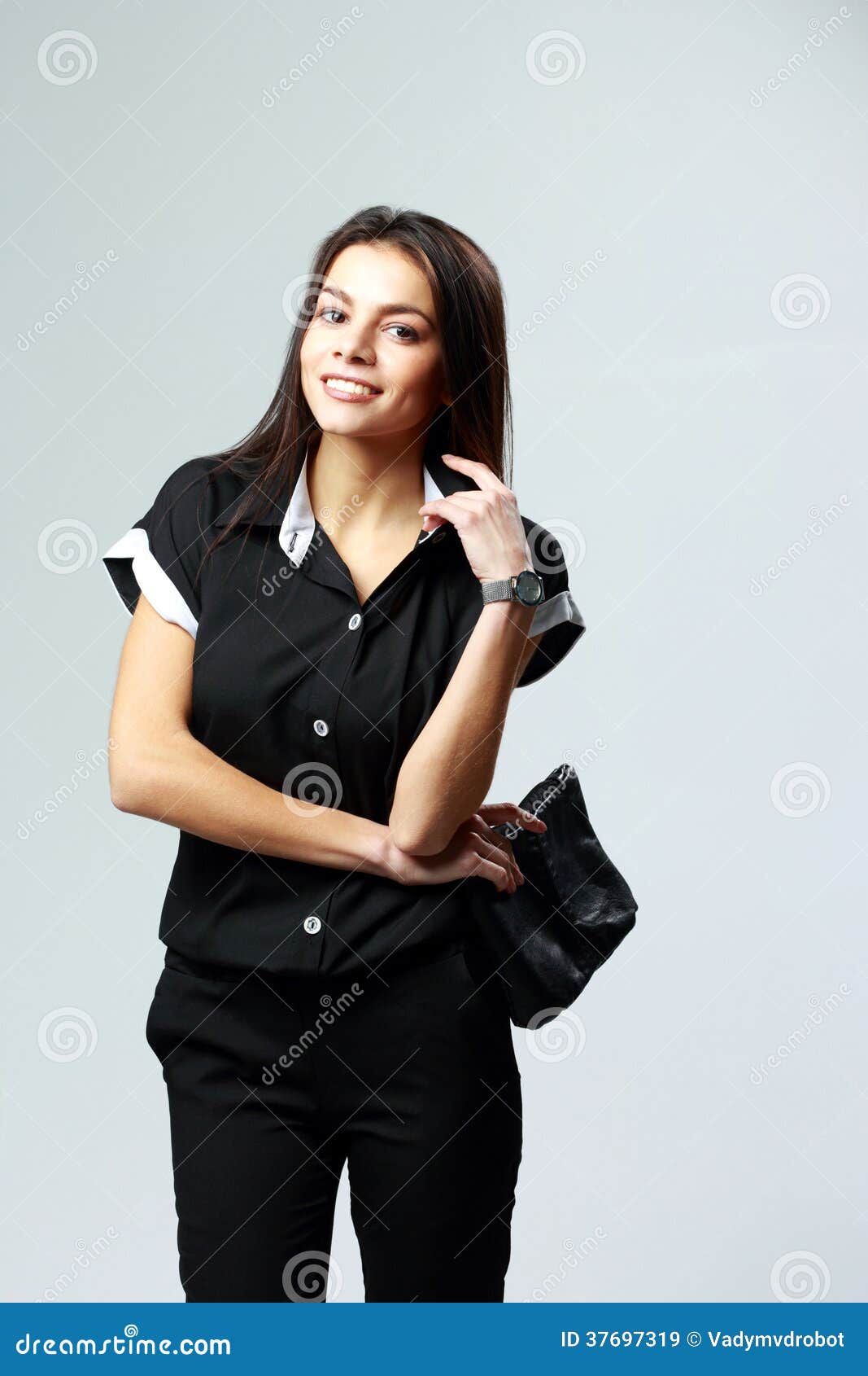 Young Smiling Woman in Black Formal Clothes Standing Stock Image ... Young Smiling Woman in Black Formal Clothes Standing Stock Image ...
