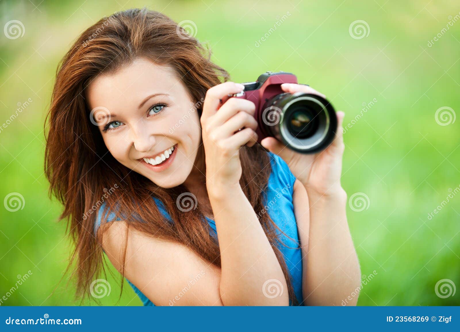 Young Smiling Woman with Camera Stock Image - Image of lens, objective ...