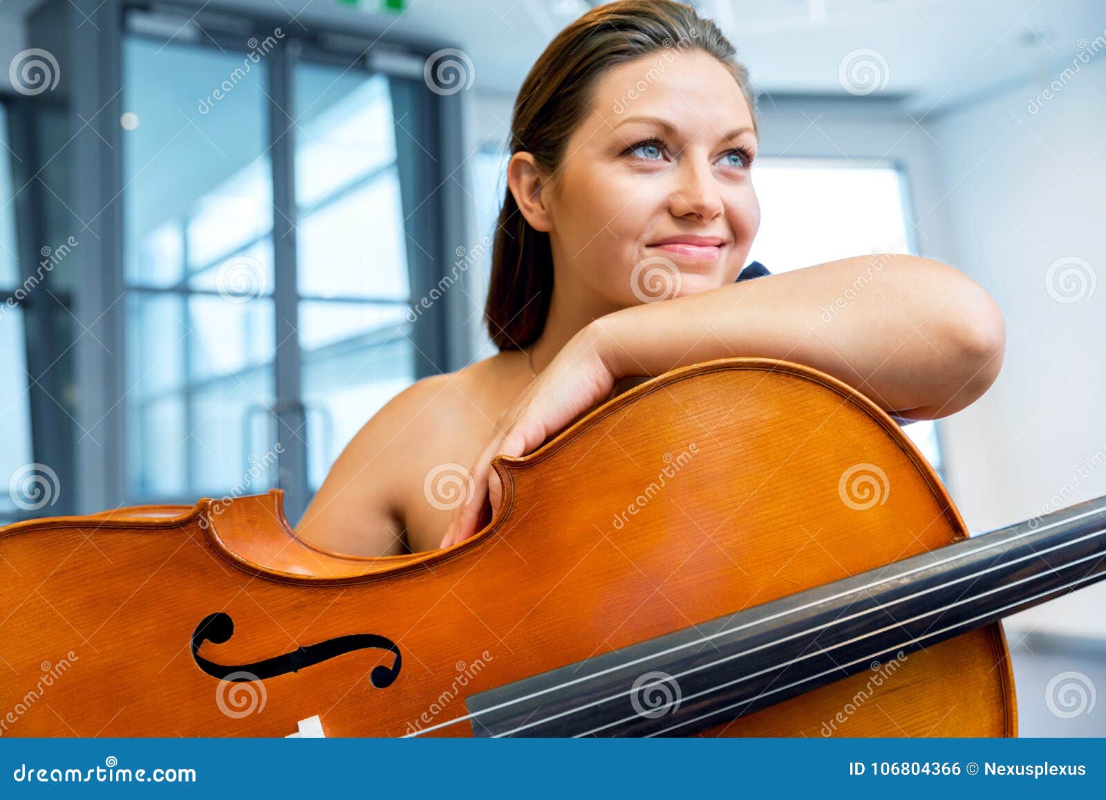 Woman with a cello stock photo. Image of symphony, sitting - 106804366