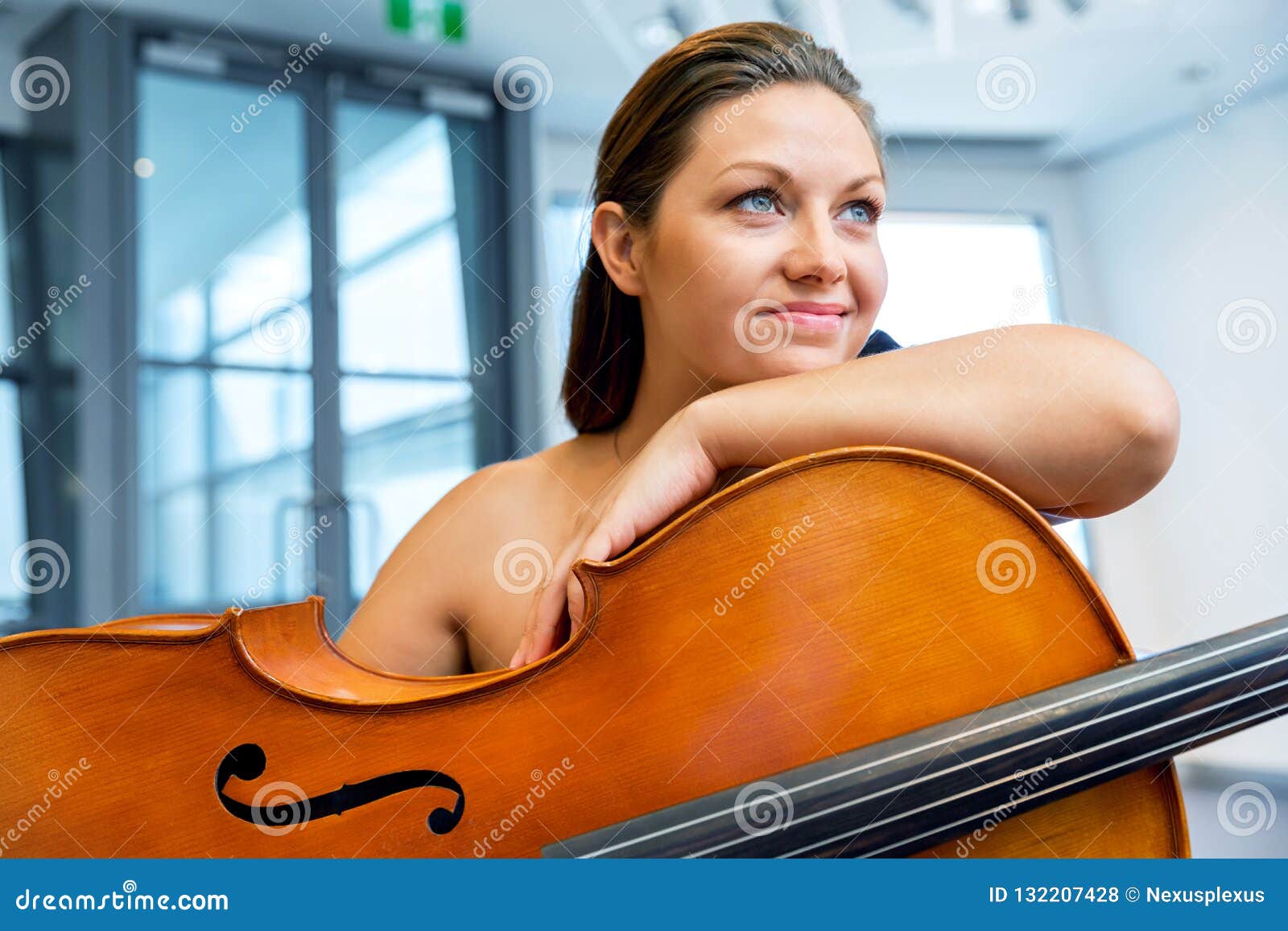 Woman with a cello stock photo. Image of sitting, playing - 132207428
