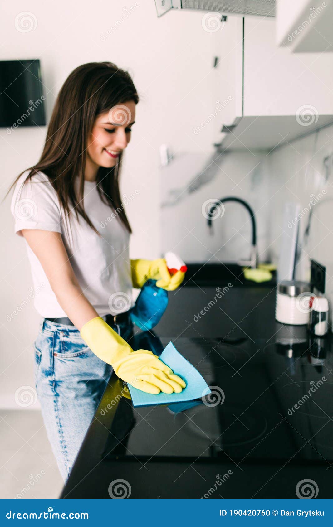 Young Smiling Woman Cleans the Kitchen at Home Stock Photo - Image of ...