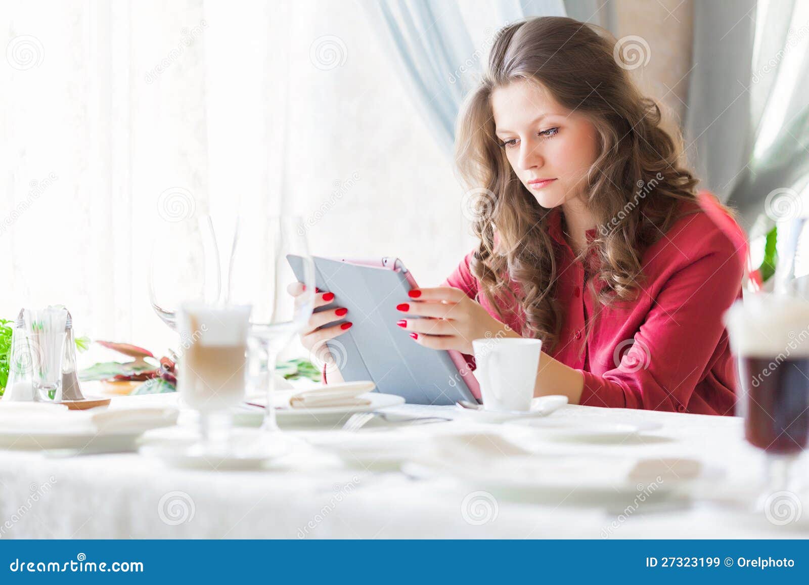 Young Smiling Woman Is Drinking Coffee In A Cafe Stock Image Image Of