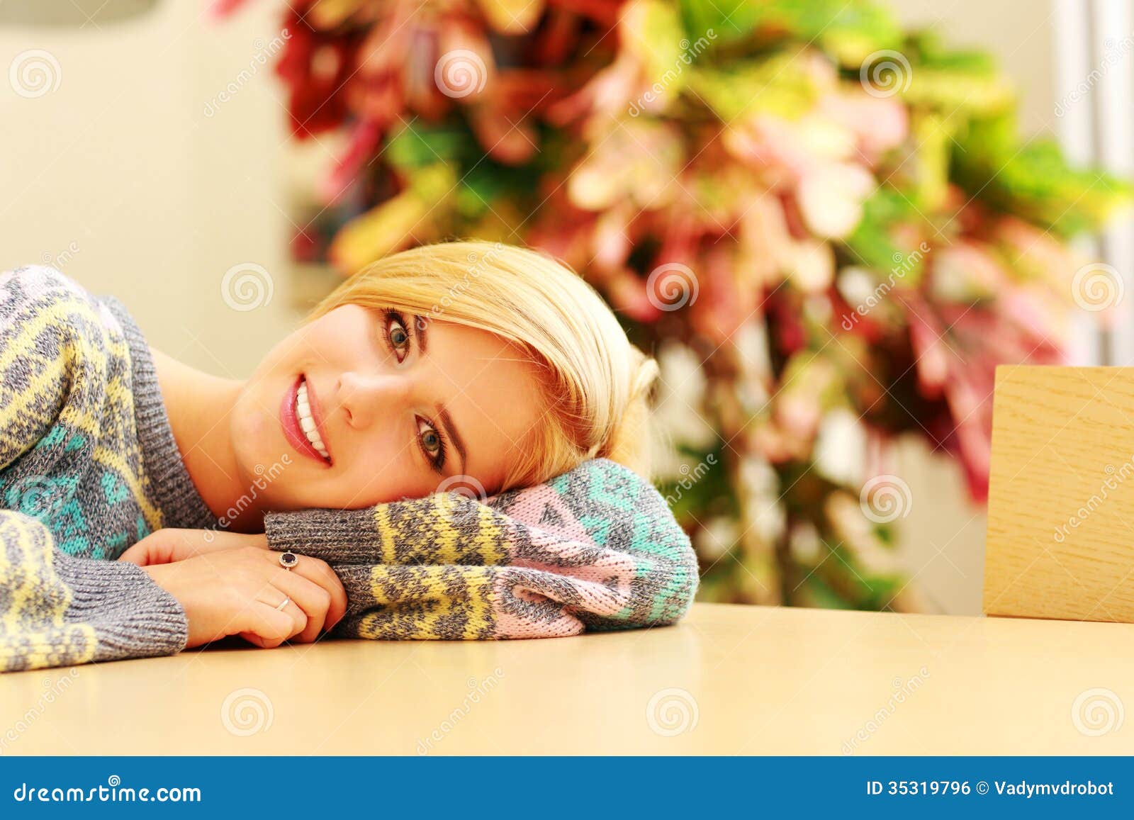 Young Smiling Woman Lying on the Table Stock Photo - Image of laughing ...