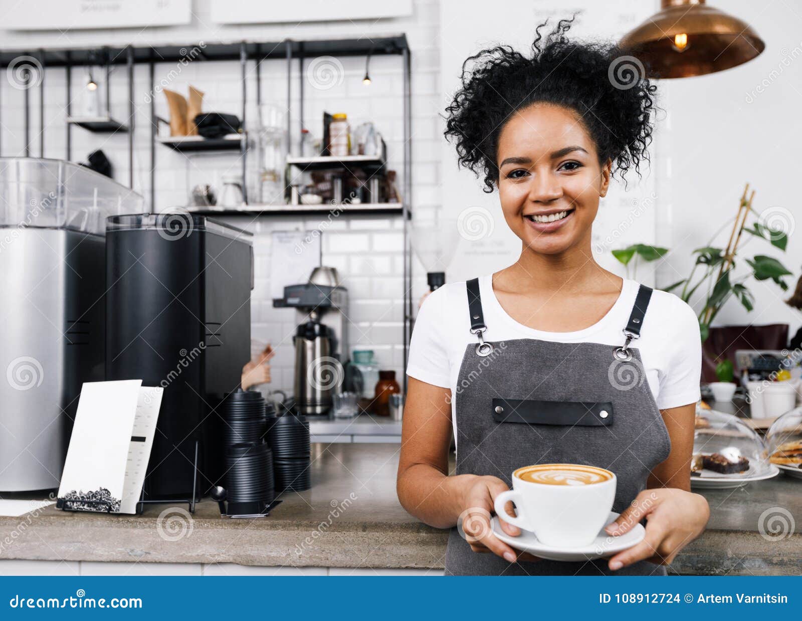 Young Smiling Woman Standing in Cafeteria Stock Photo - Image of small ...