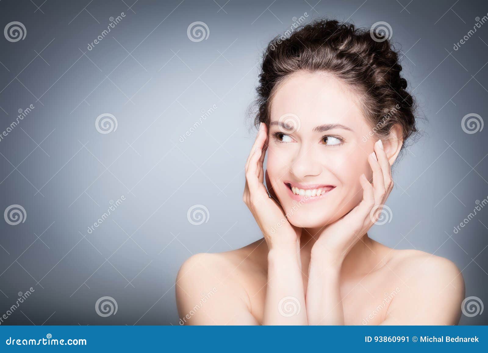 Young Smiling Woman Touching Her Healthy Fresh Face Stock Image