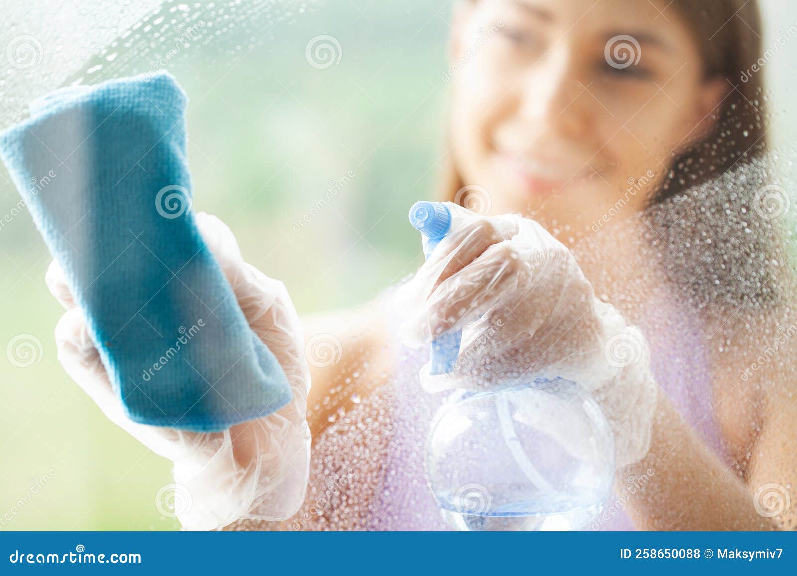 Young Smiling Woman Washing Window with Sponge. Stock Photo - Image of ...