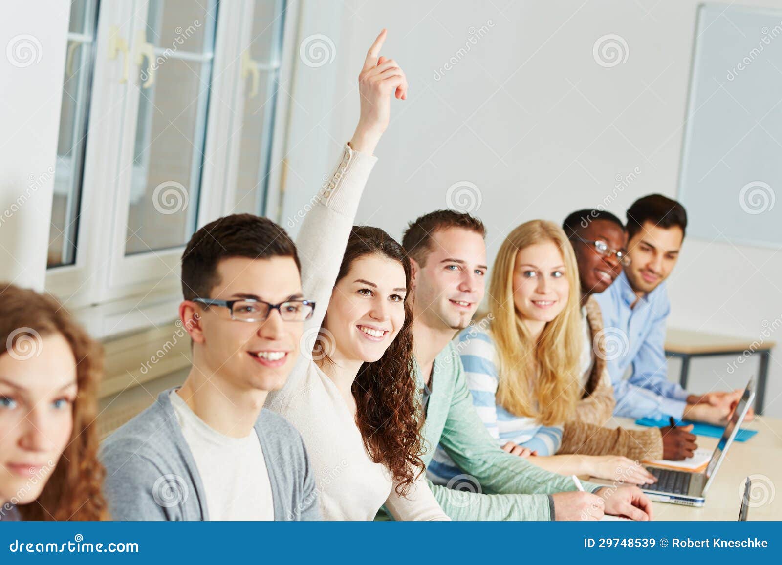 Young woman raising hand stock image. Image of happy - 29748539