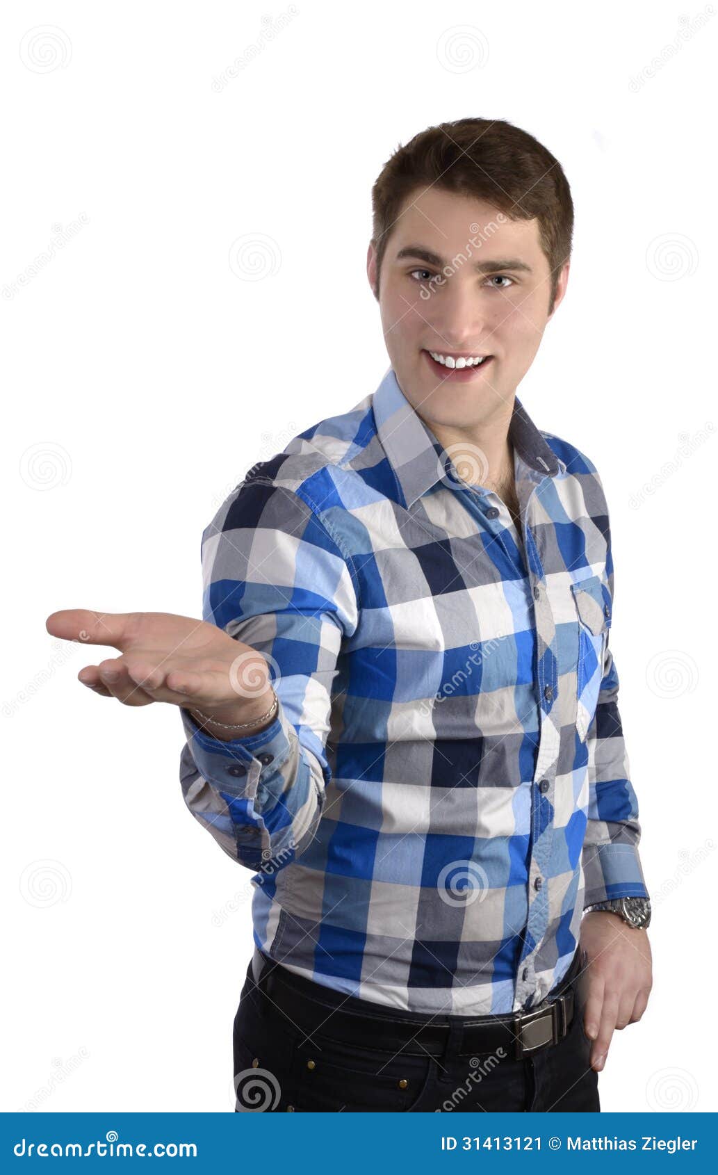 Young Smilling Man in Blue Shirt Presenting Something Stock Image ...