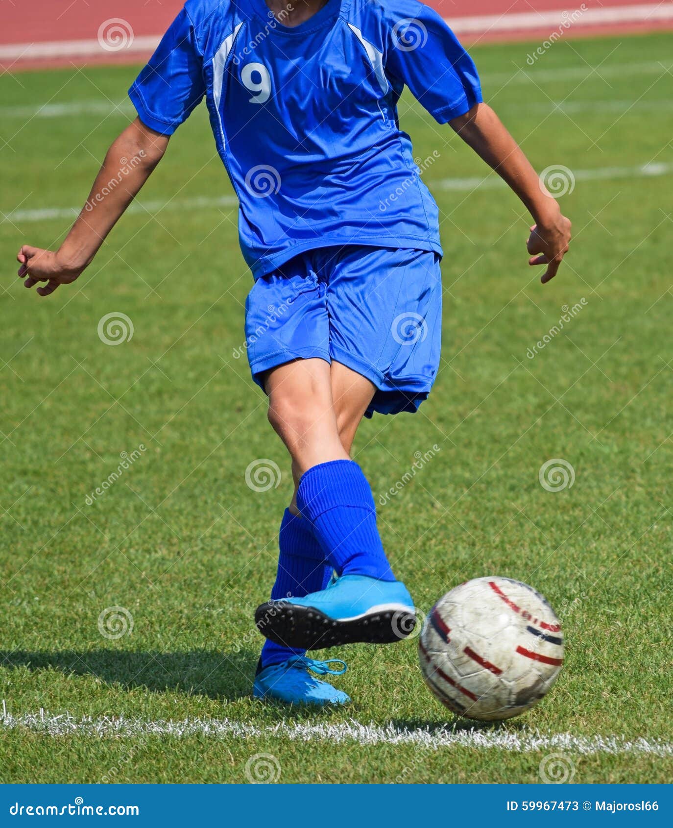 Young soccer player stock image. Image of grass, defender - 59967473