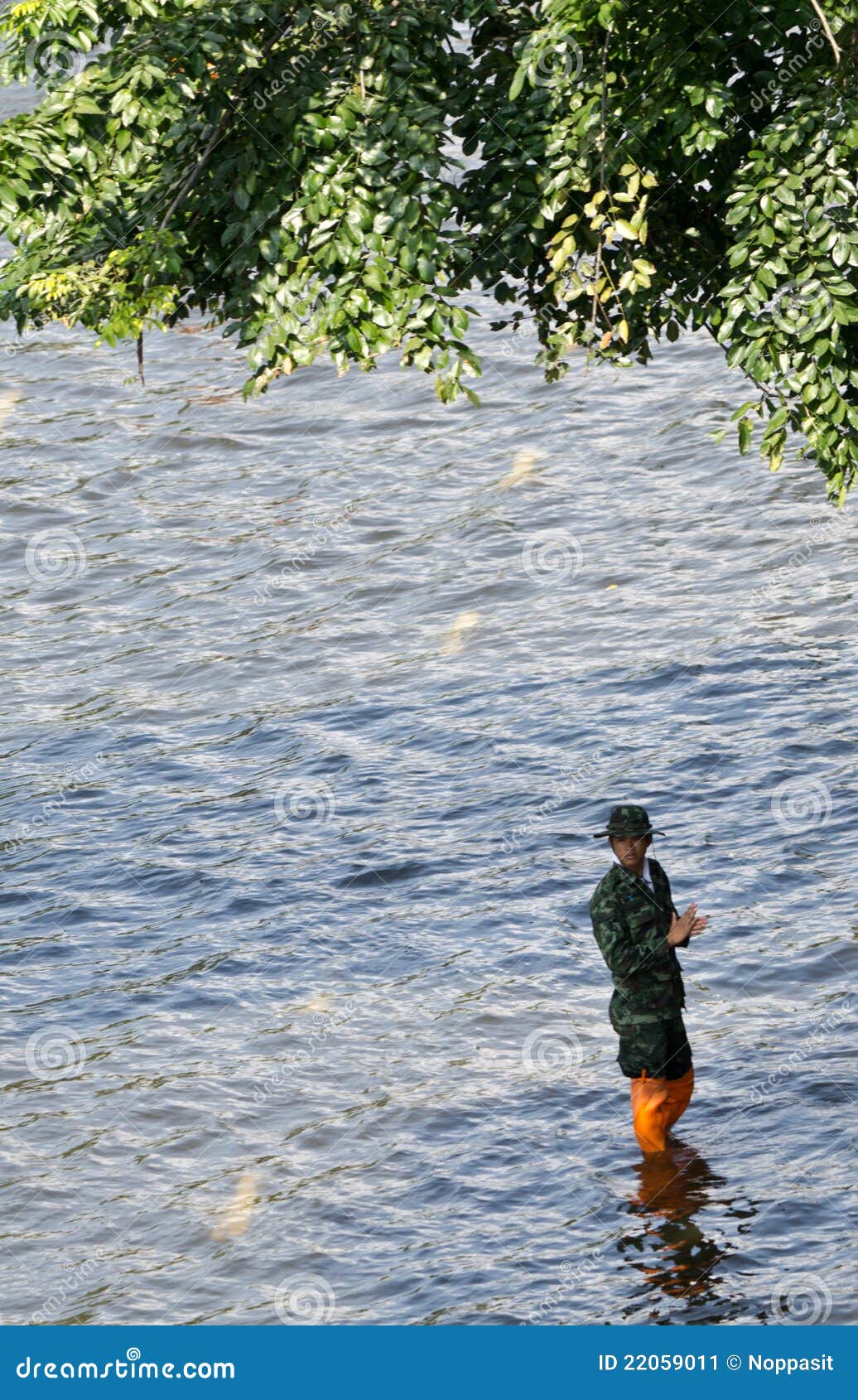 A young soldier in water editorial photo. Image of city - 22059011