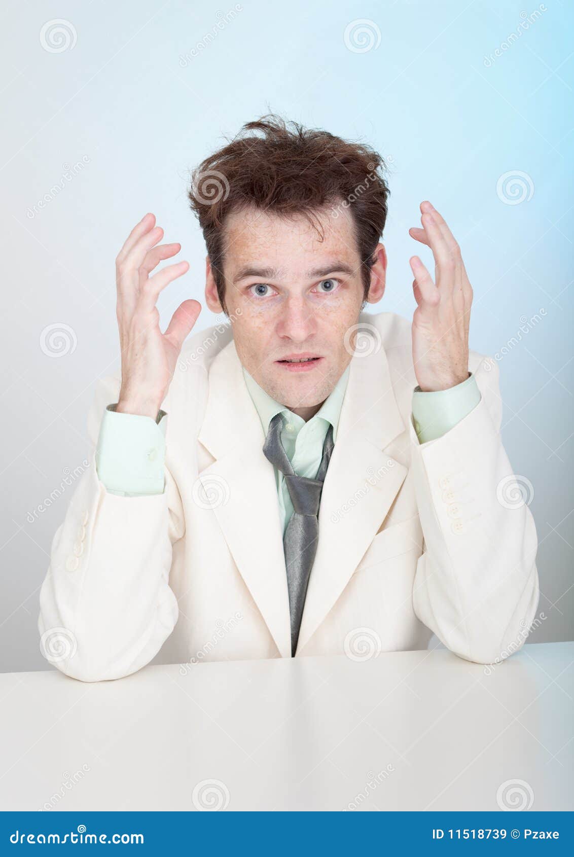 Young Sorrowful Man in White Suit Sits at Table Stock Image - Image of ...