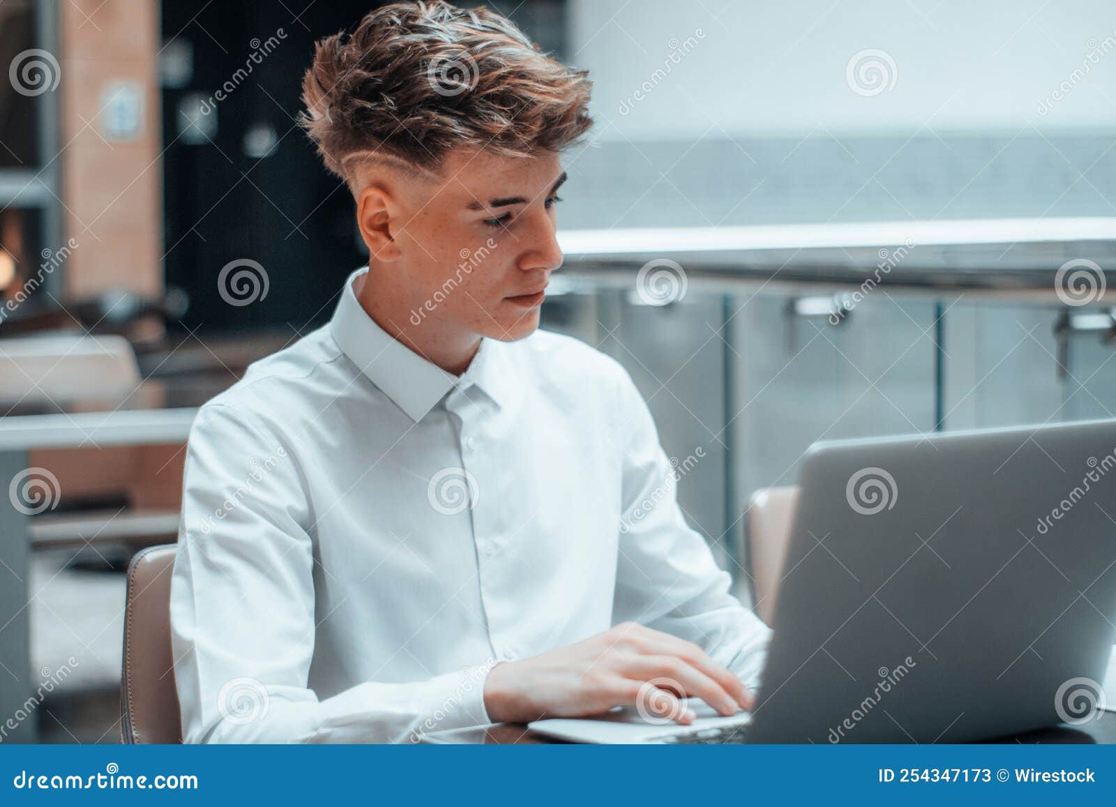 Young Spanish Man Working on a Computer Stock Image - Image of laptop ...