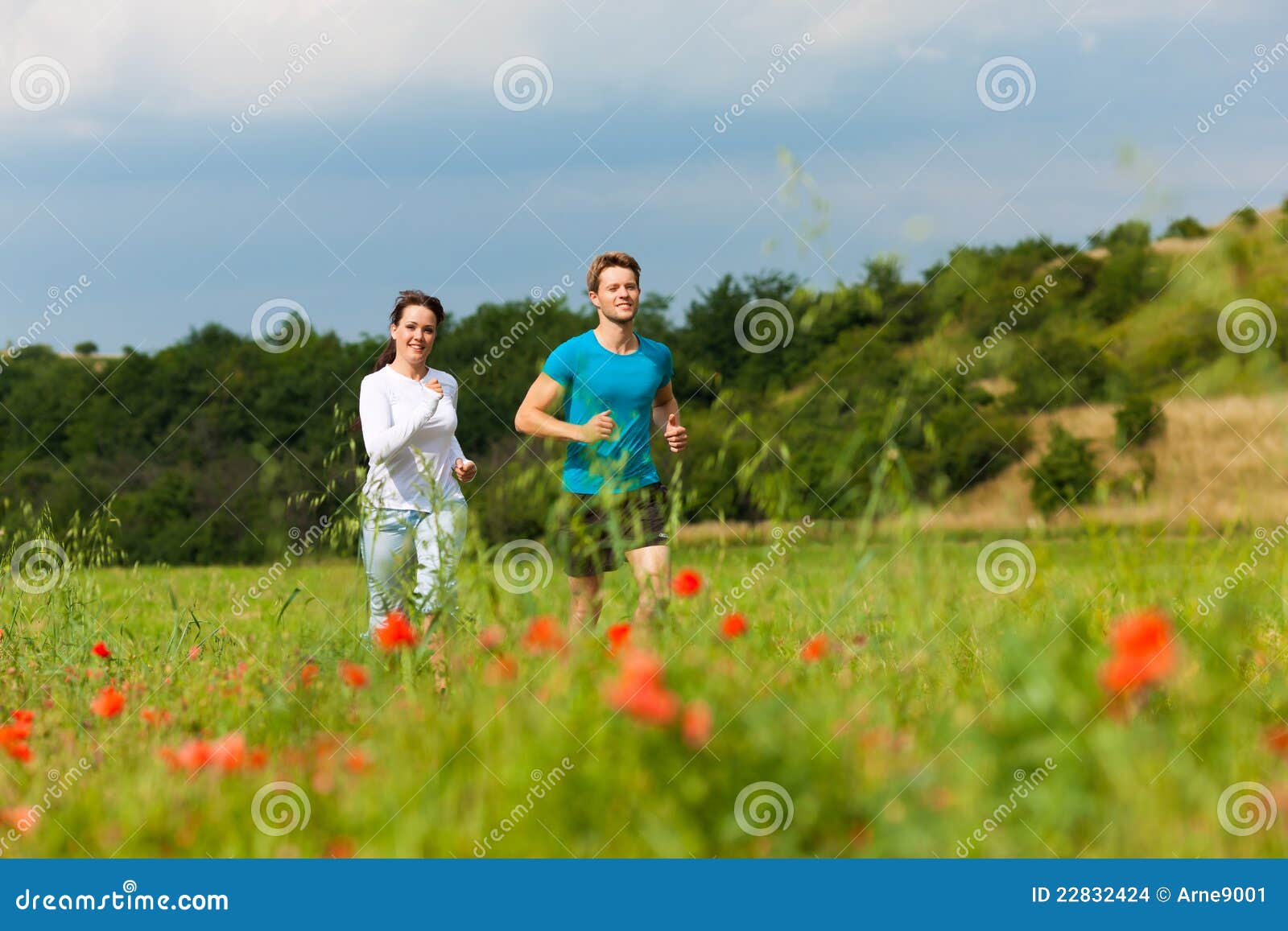 Young Sportive Couple is Jogging Outside Stock Photo - Image of ...