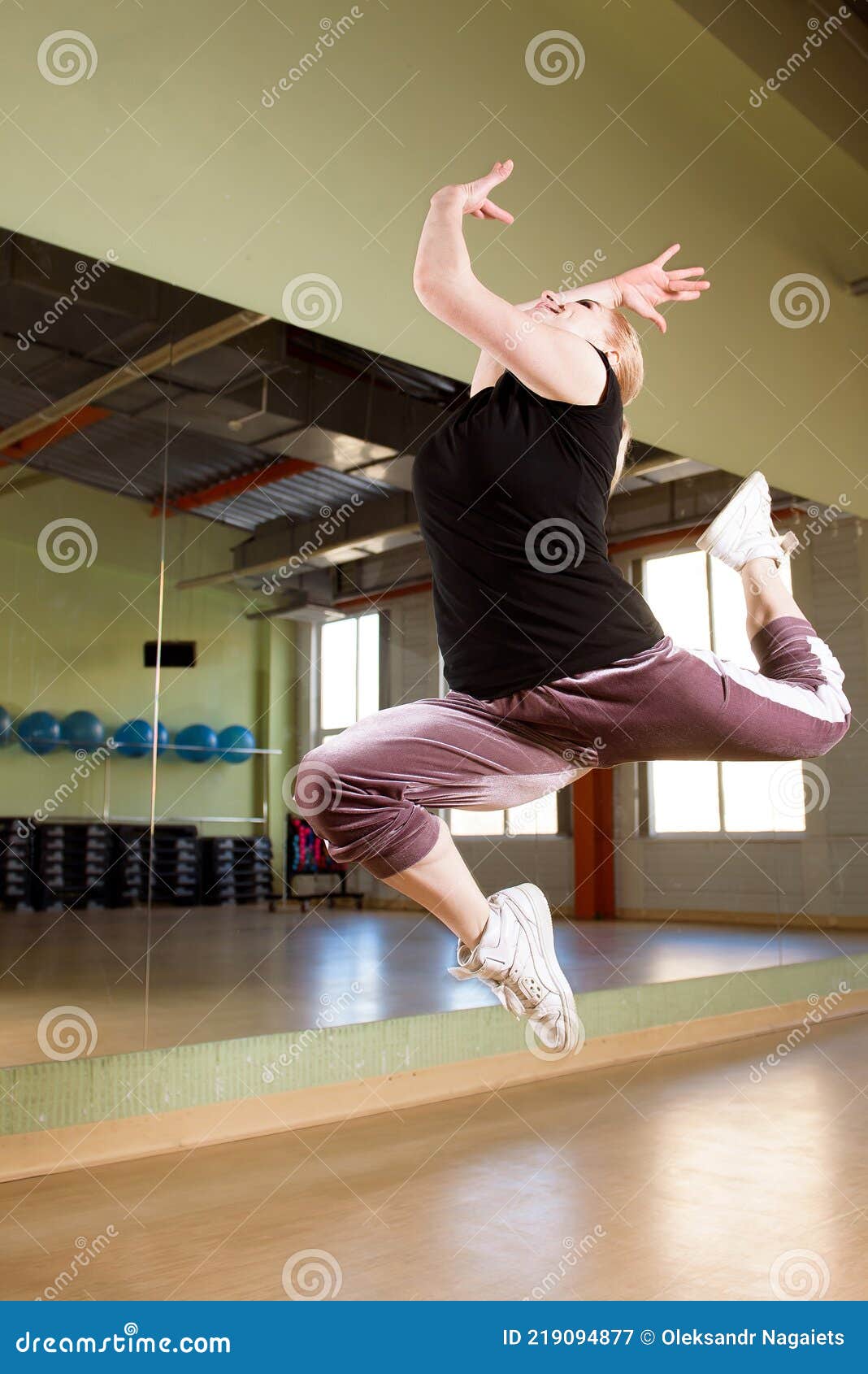 Young Sports Trainer Dancing in the Gym. Stock Image - Image of ...
