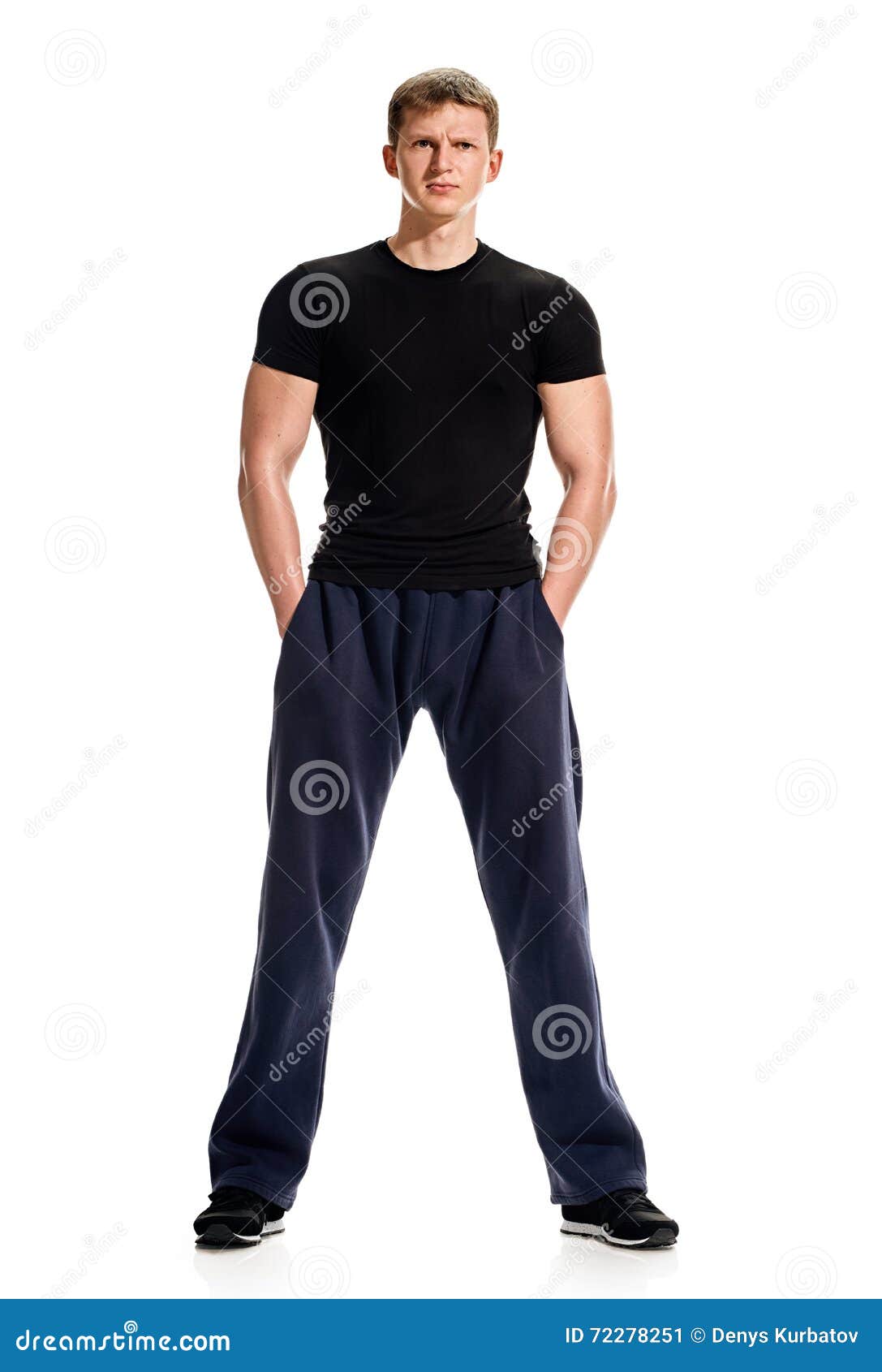 Young sporty man standing stock image. Image of male - 72278251 Young sporty man standing stock image. Image of male - 72278251