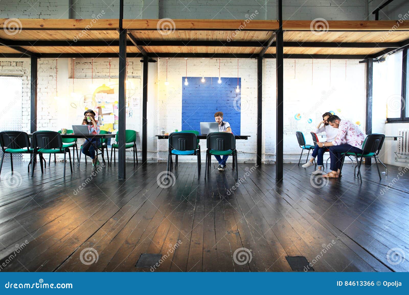 Young Startup Group Working in Modern Office. Open Space, Laptops and ...