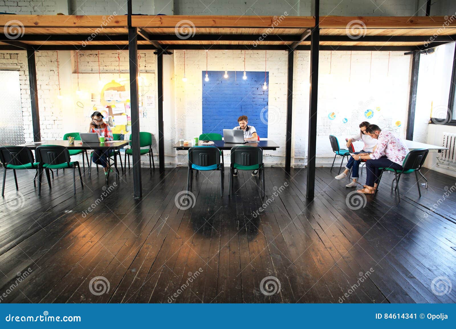 Young Startup Group Working in Modern Office. Open Space, Laptops and ...