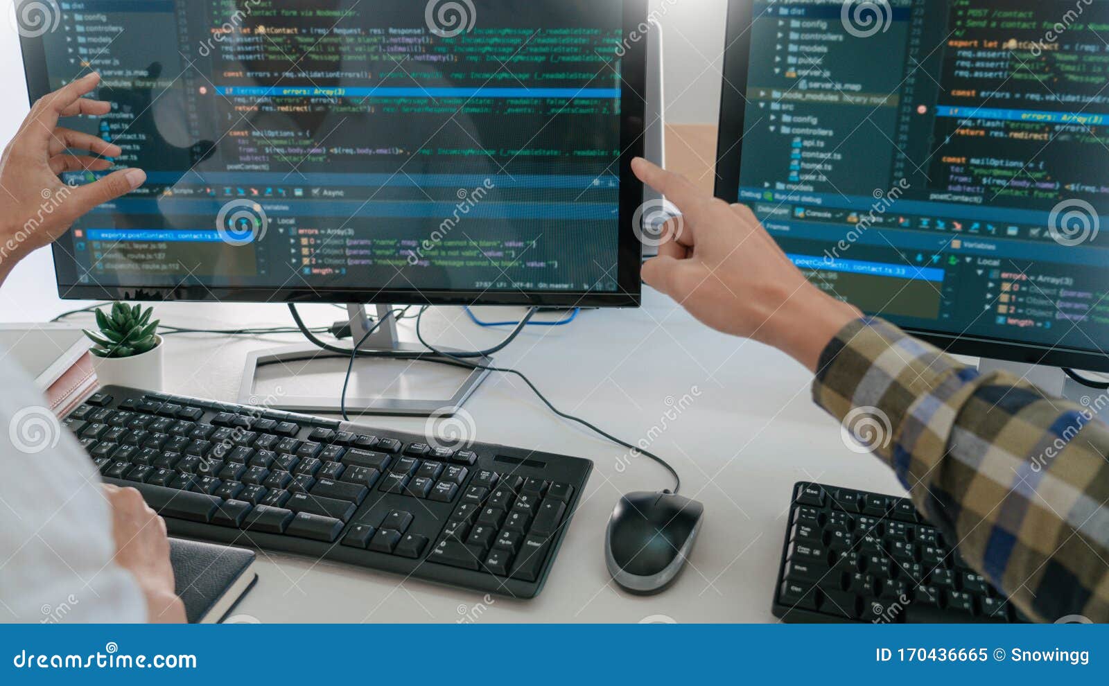 Young Startup Programmers Sitting at Desks Working on Computers Screen ...