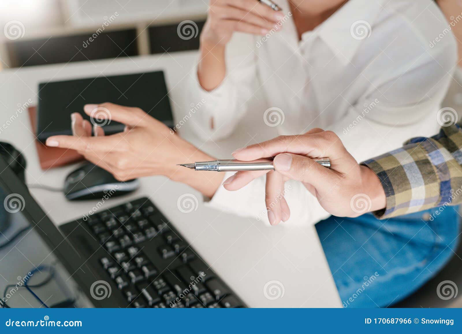 Young Startup Programmers Sitting at Desks Working on Computers Screen ...