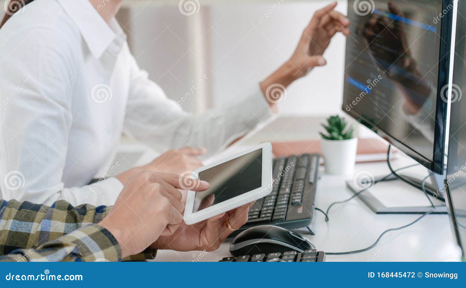 Young Startup Programmers Sitting at Desks Working on Computers Screen ...